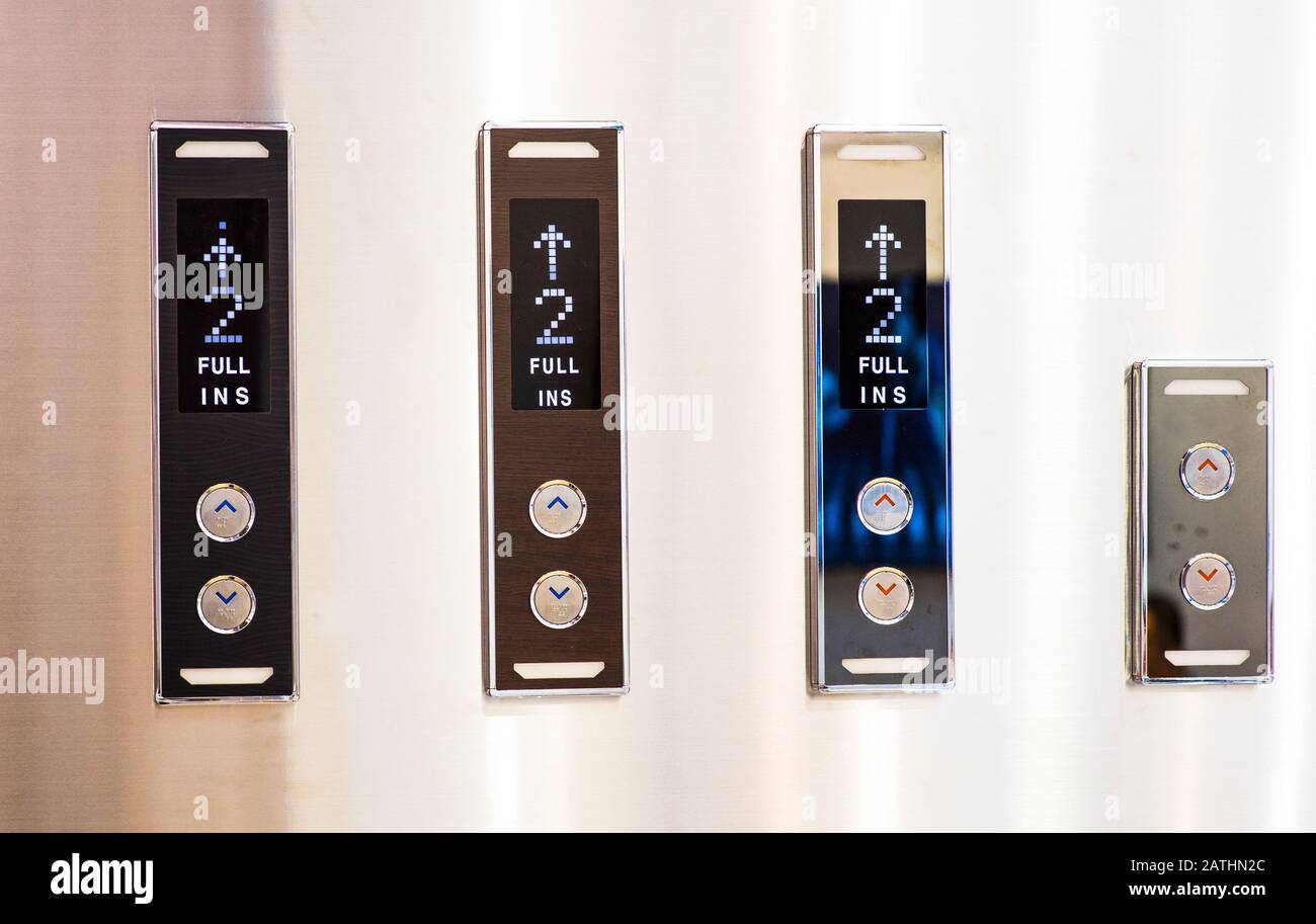 Different buttons in modern metal elevator Stock Photo - Alamy
