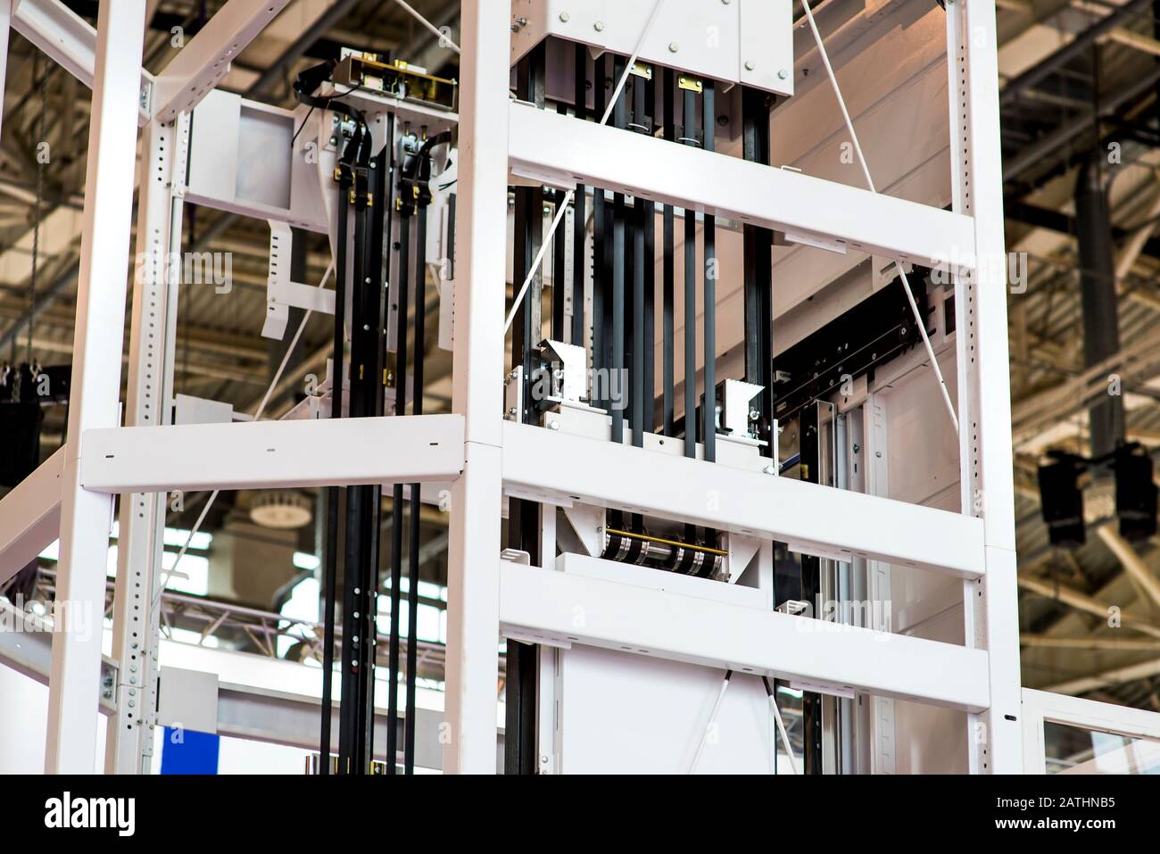 Glass elevator ,Businessman taking modern glass elevator to the upper ...