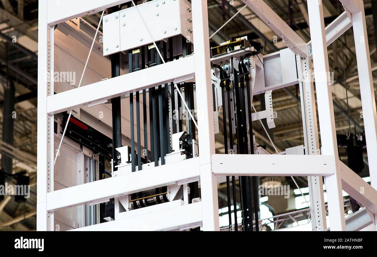 Elevator Installation, Lift Technician Installing a Modern Elevator ...