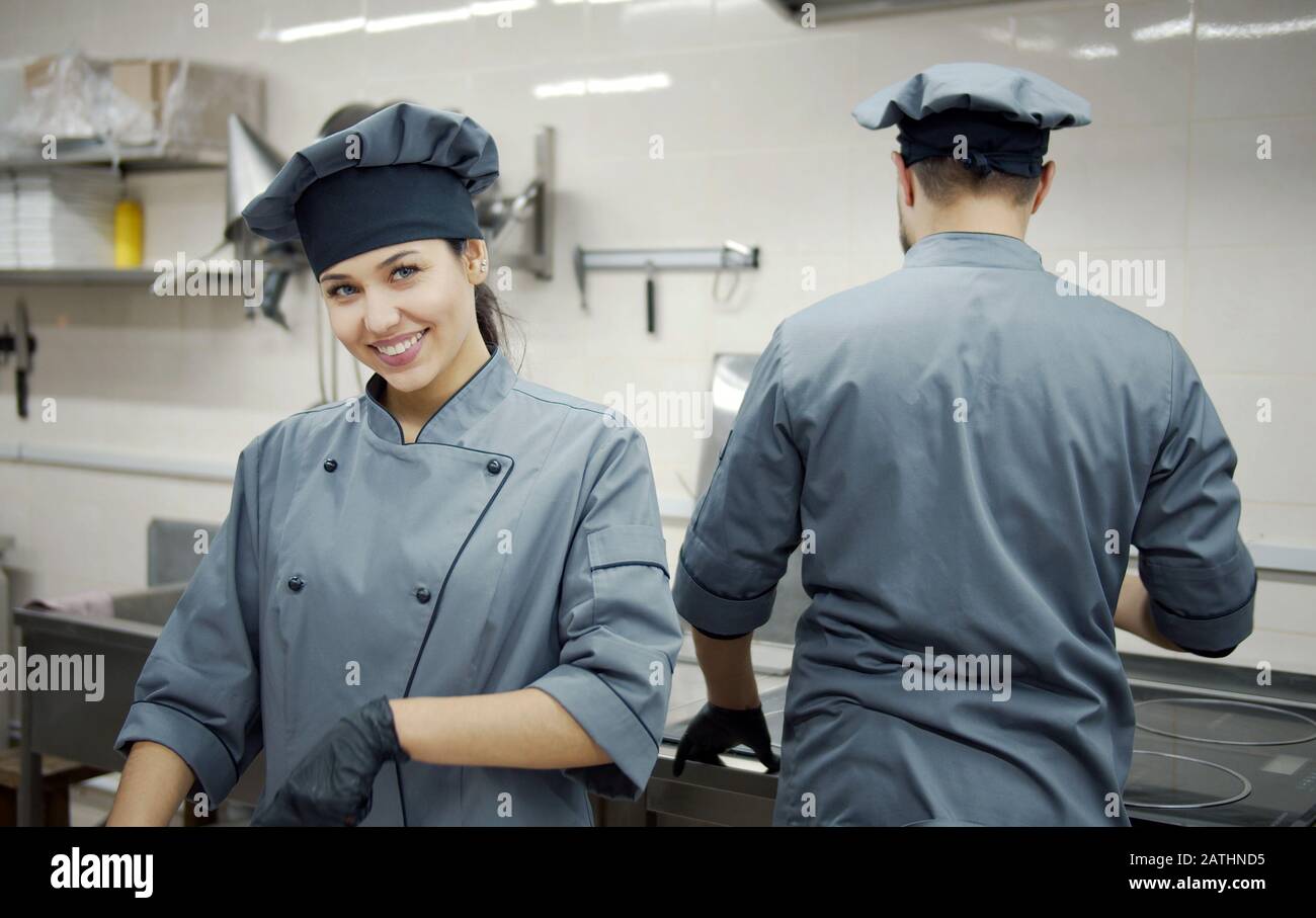 Woman cooks stove in hi-res stock photography and images - Alamy