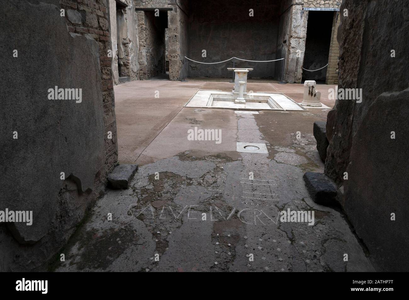 pompei ruins houses salve lucrum english welcome money detail Stock Photo - Alamy
