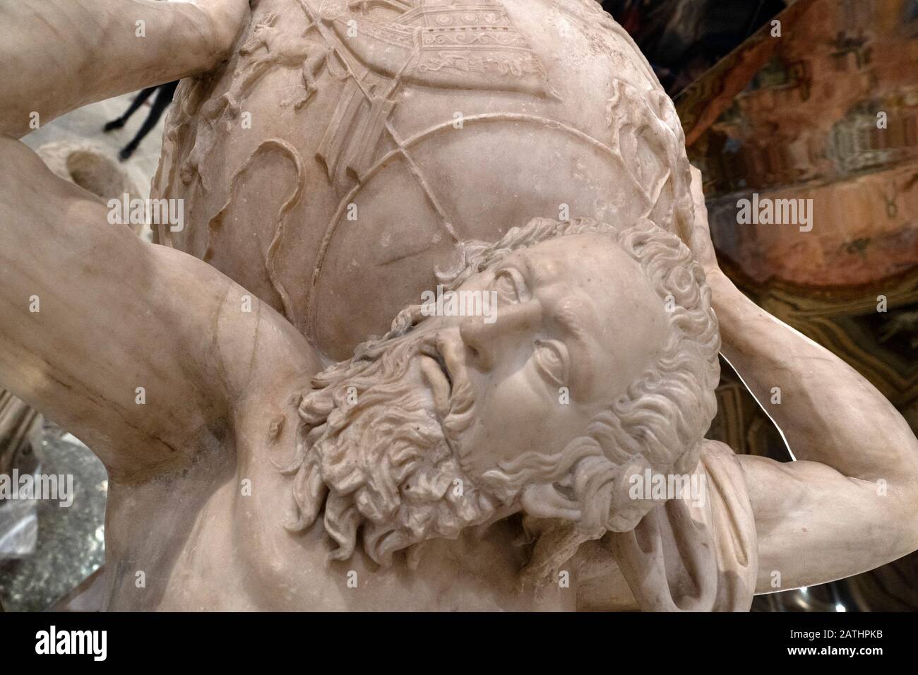 Atlas holding the earth globe marble statue Stock Photo - Alamy