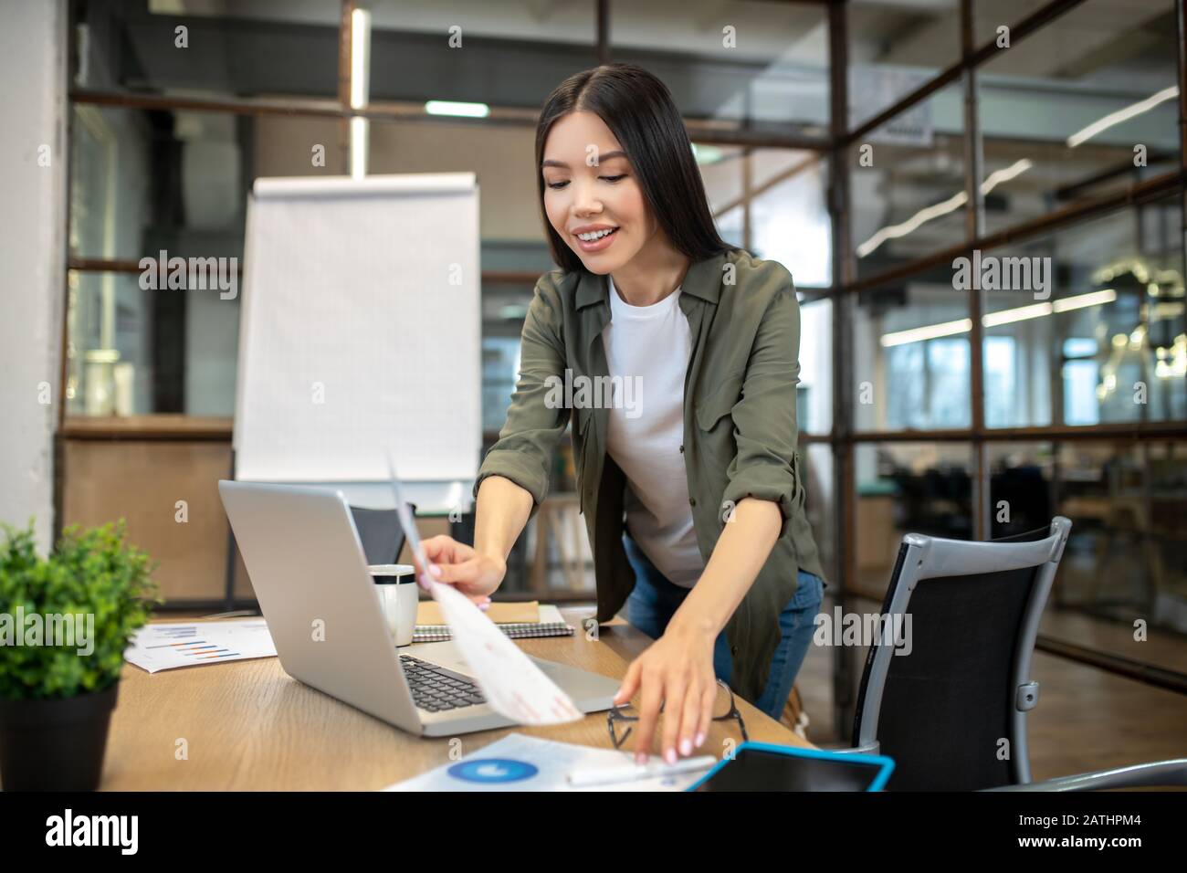 Business girl looking working papers hi-res stock photography and ...