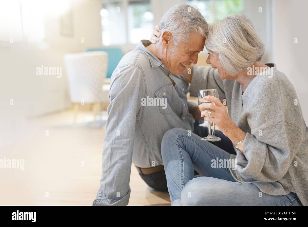 Romantic couple sharing glass hi-res stock photography and images - Alamy