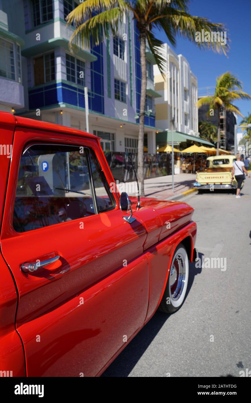 Red old fashioned pickup in Miami beach Stock Photo - Alamy
