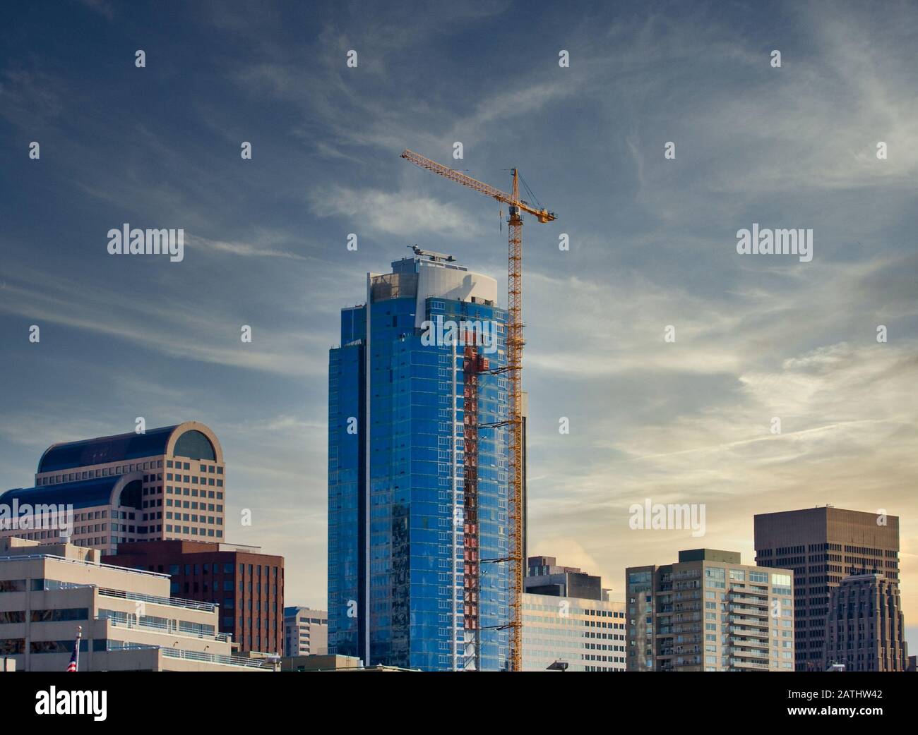 Blue Glass Tower at Sunset Stock Photo - Alamy