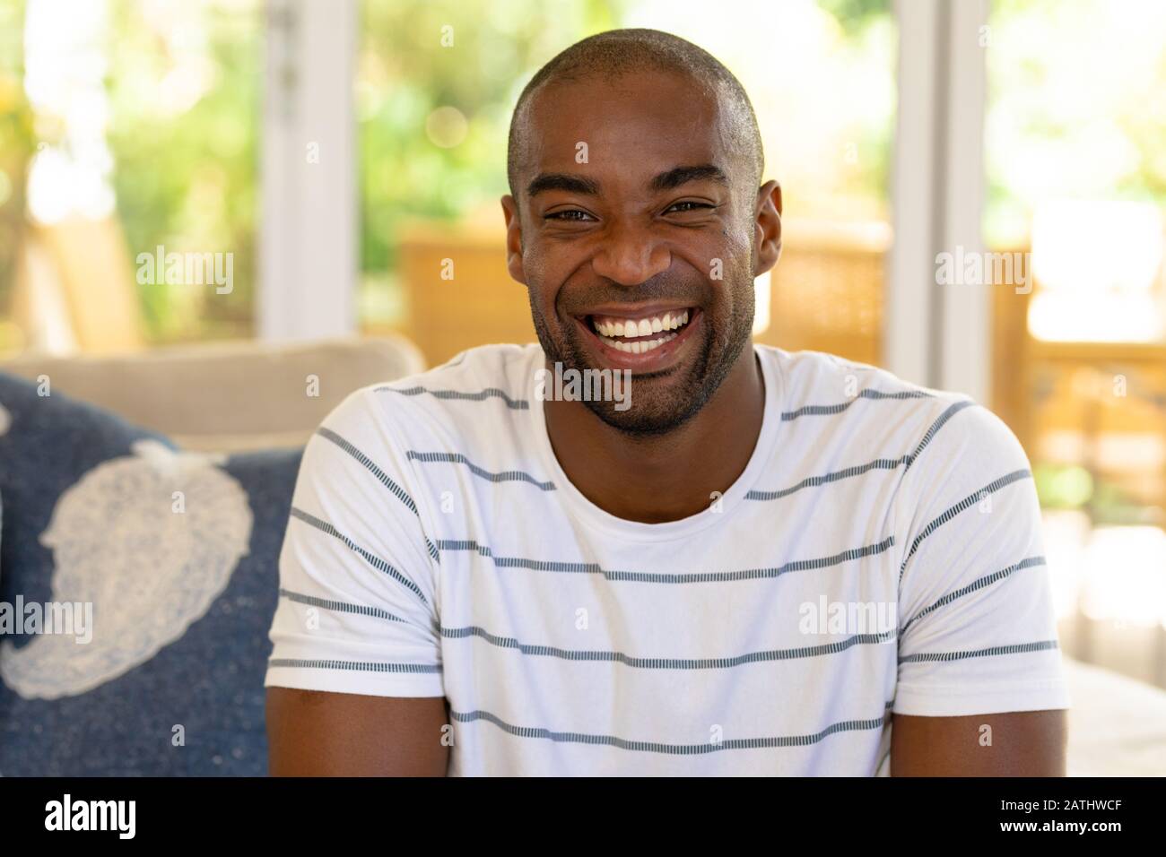 Young man at home real hi-res stock photography and images - Alamy