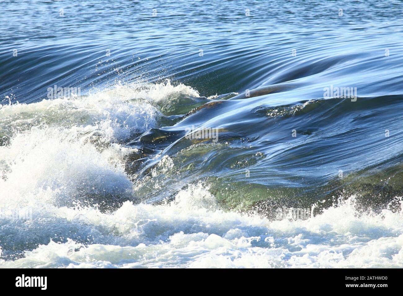 Water splashing in fast river flow Stock Photo - Alamy
