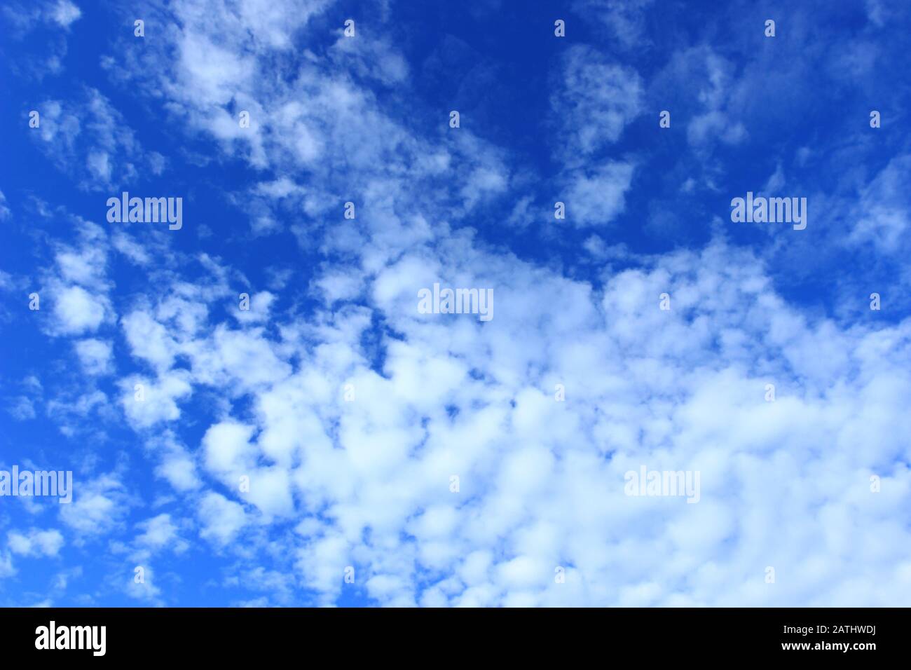 Blue sky with nice weather clouds Stock Photo - Alamy