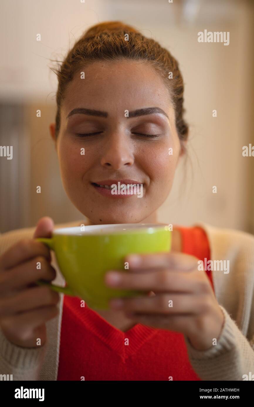 Young woman home enjoying cup hi-res stock photography and images - Alamy