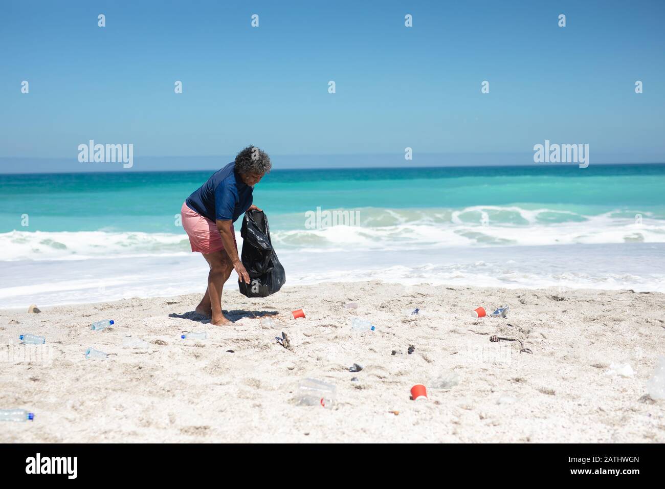 Old woman recycling hi-res stock photography and images - Alamy