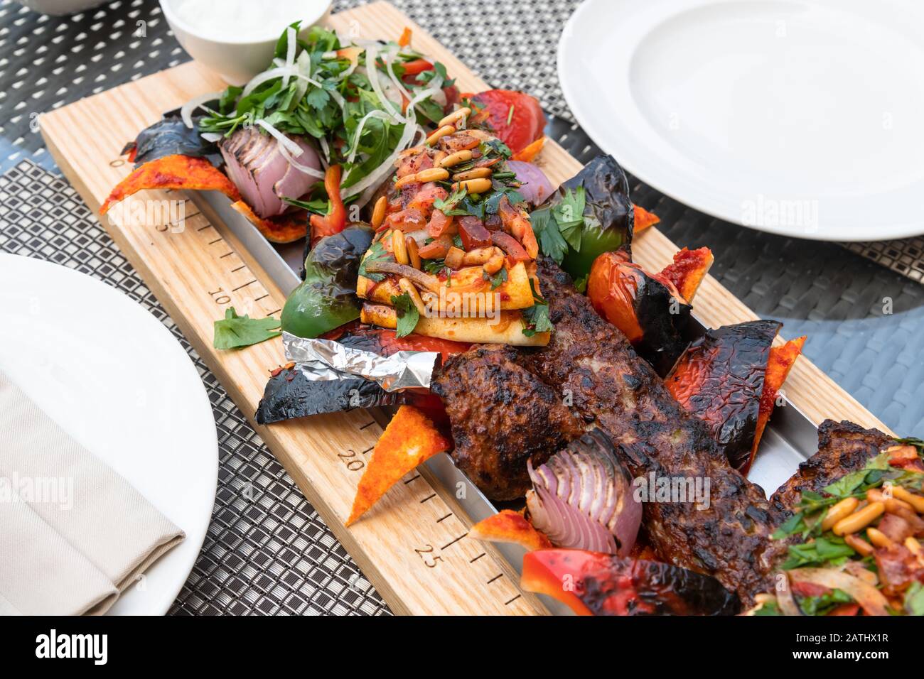 Kebab - traditional Turkish dish. Cooked on fire Stock Photo - Alamy