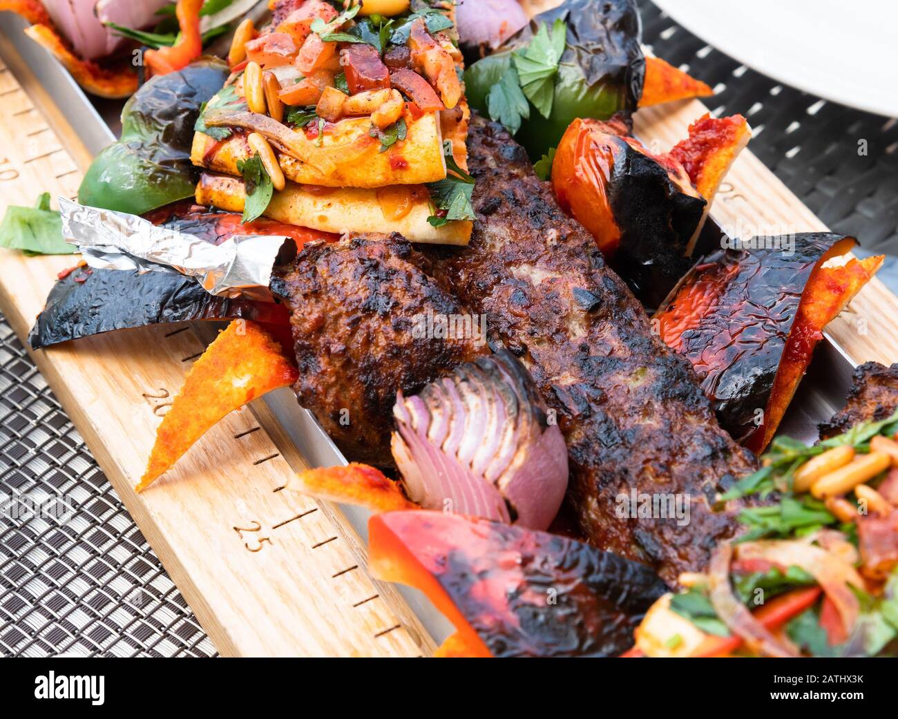 Kebab - traditional Turkish dish. Cooked on fire Stock Photo - Alamy