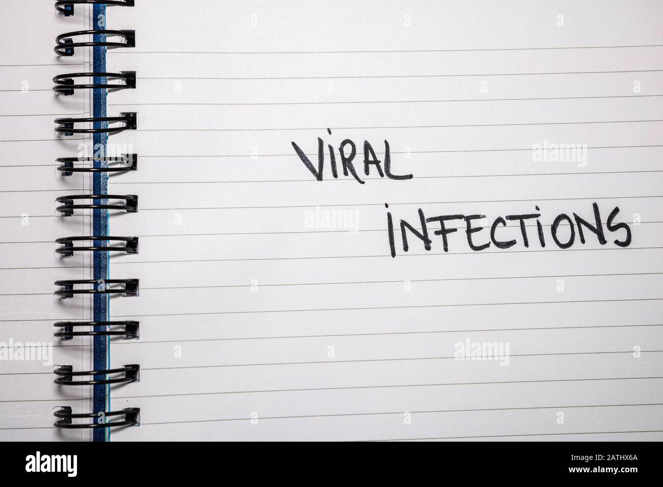 Viral infections handwriting text on paper, on office agenda. Copy ...