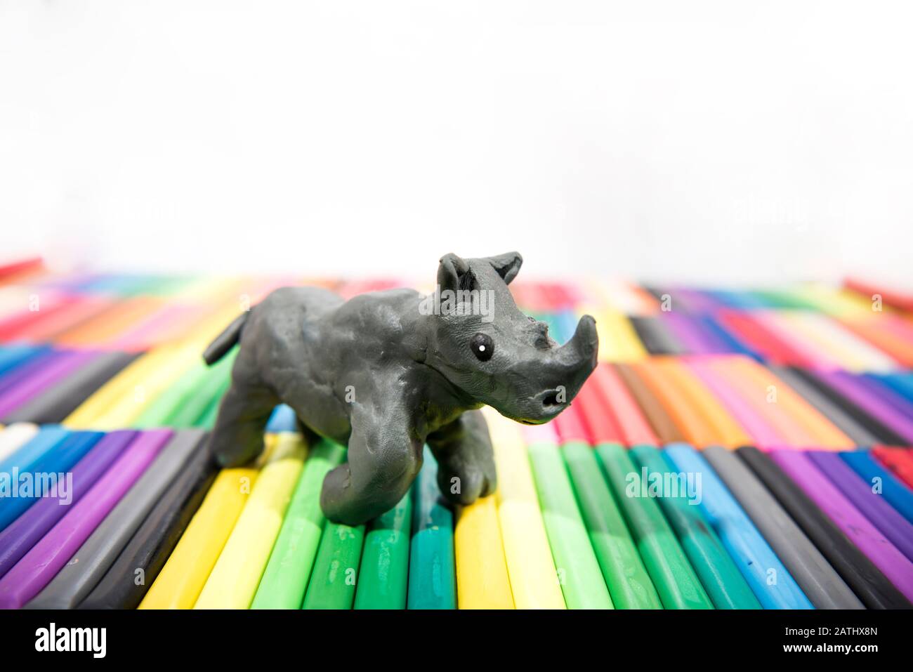 Play clay Animals. Rhinoceros on colored background Stock Photo - Alamy