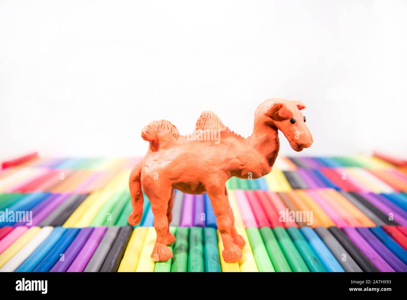 Play clay Animals. Camel on colored background Stock Photo - Alamy