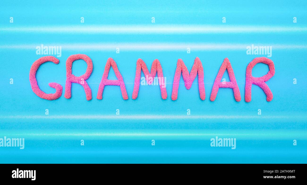 Grammar word in red letters on a blue background. Grammar and language ...