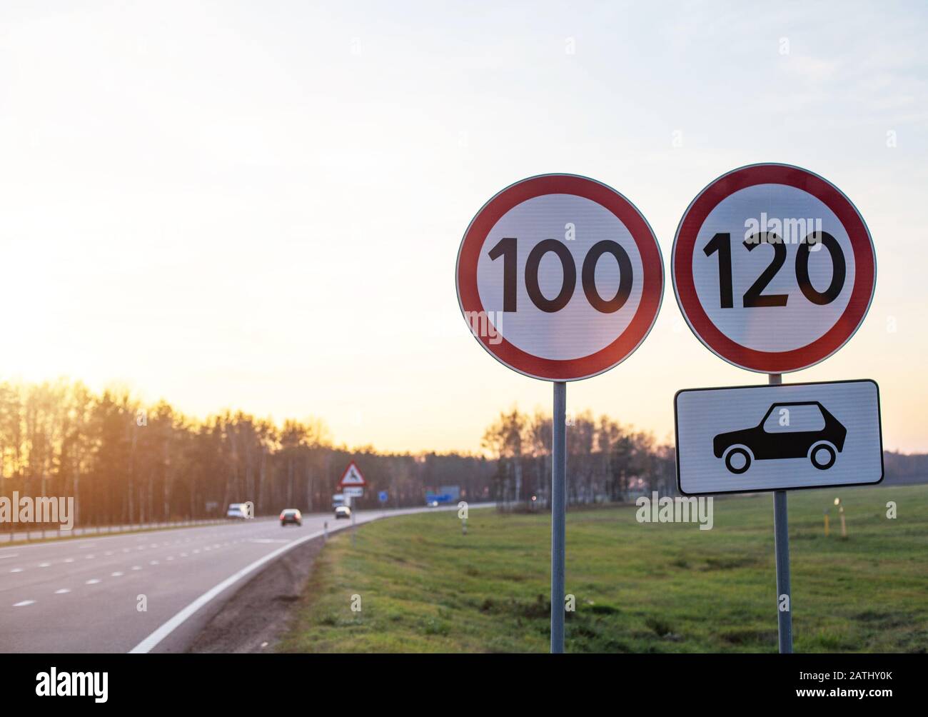 Traffic signs limit the maximum speed on the motorway. Speed and Safety ...