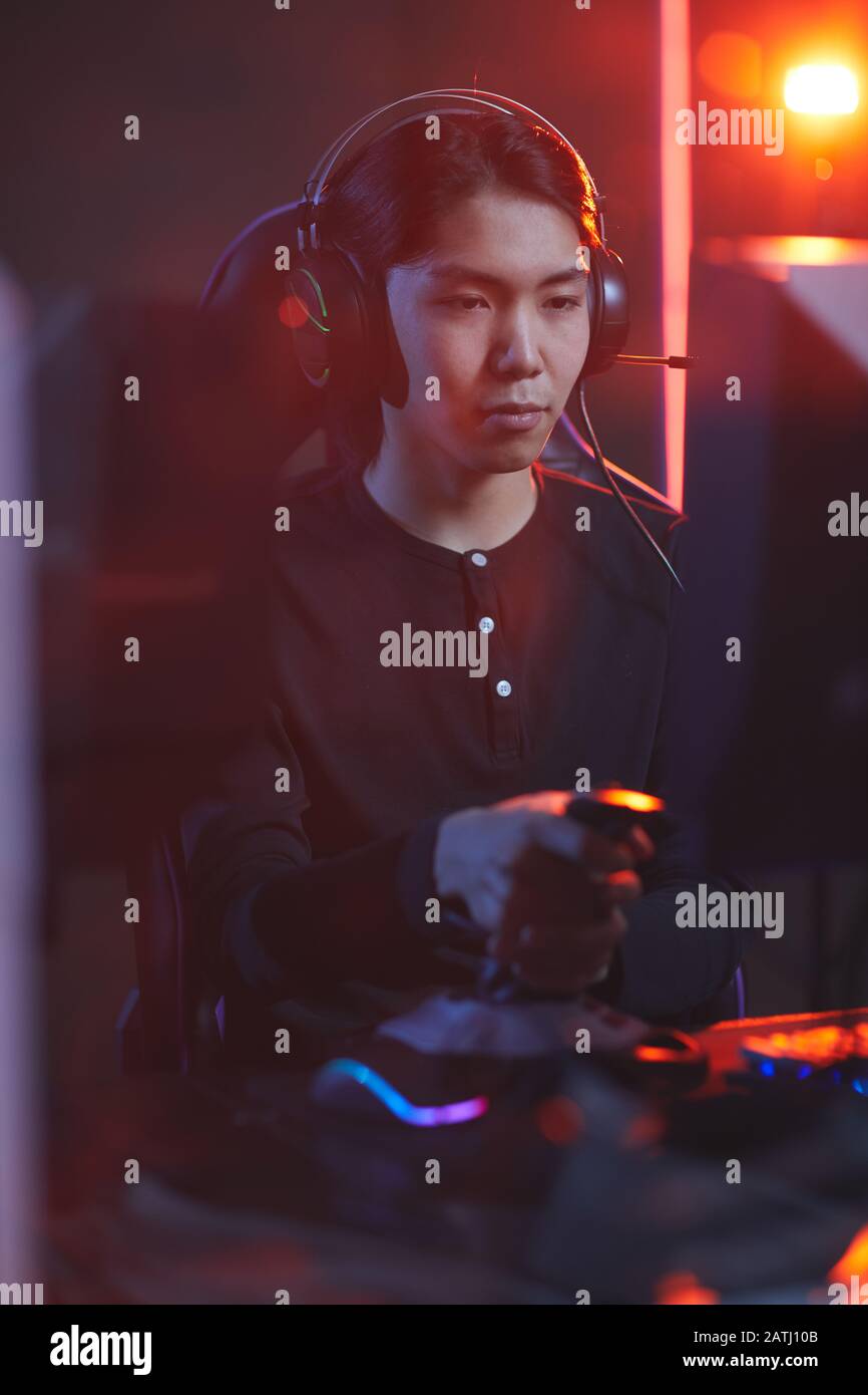 Young asian teenager playing video games hi-res stock photography and ...