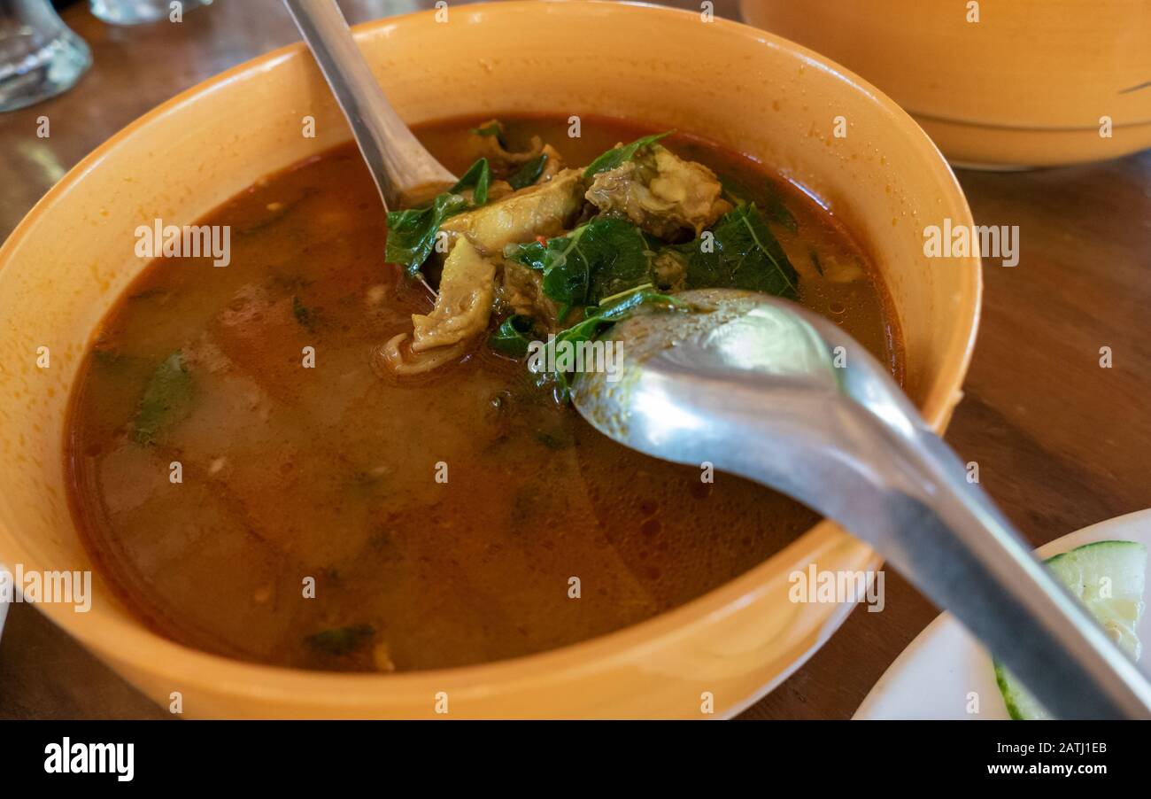 Selection of burmese dishes in rural Myanmar with skinny chicken and ...