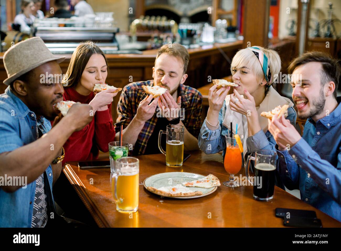 Groups Of People Eating Pizza
