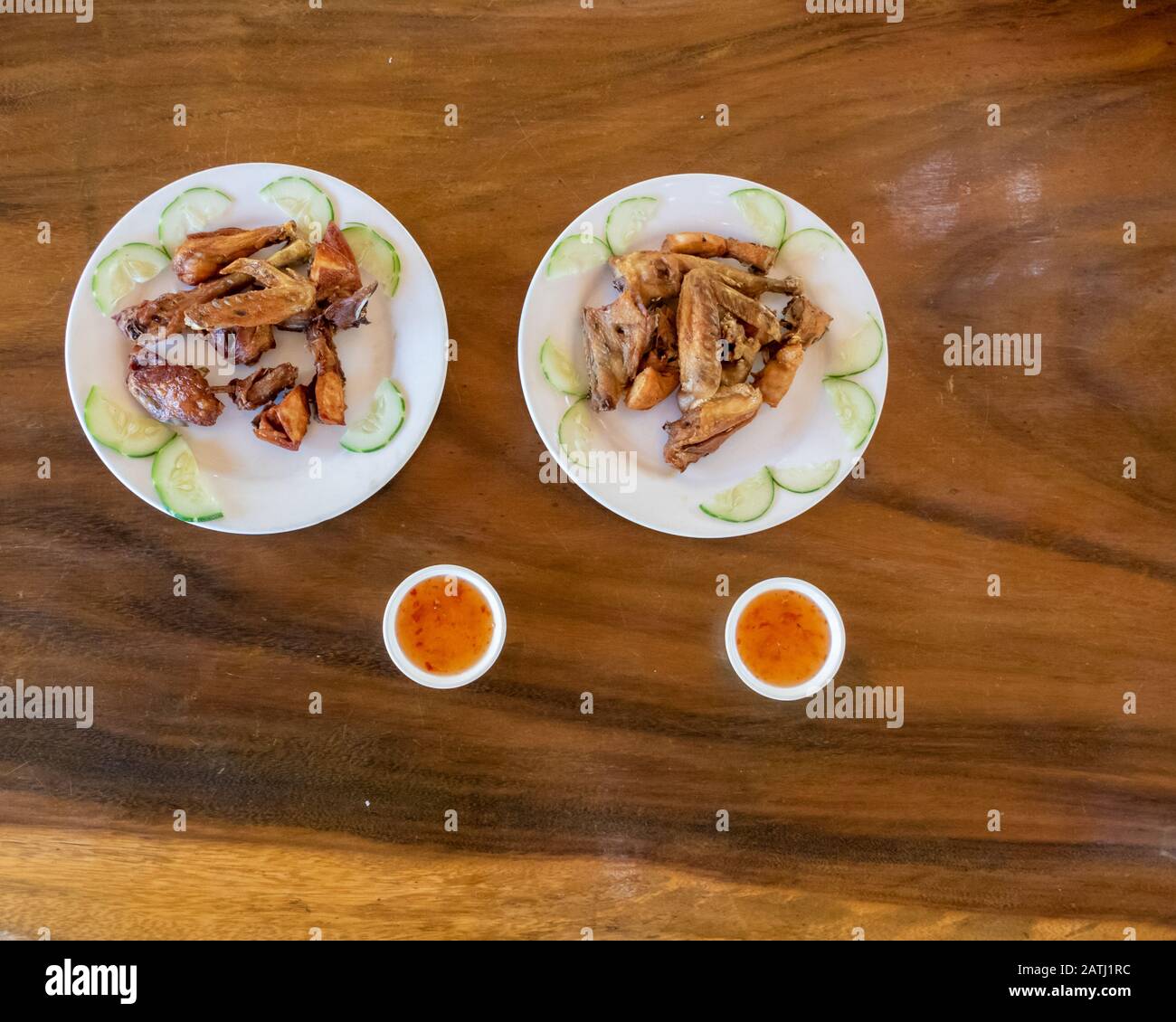 Selection of burmese dishes in rural Myanmar with skinny chicken and ...