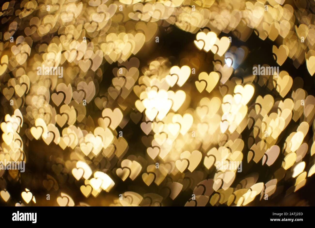 Beautiful shiny golden hearts hi-res stock photography and images - Alamy