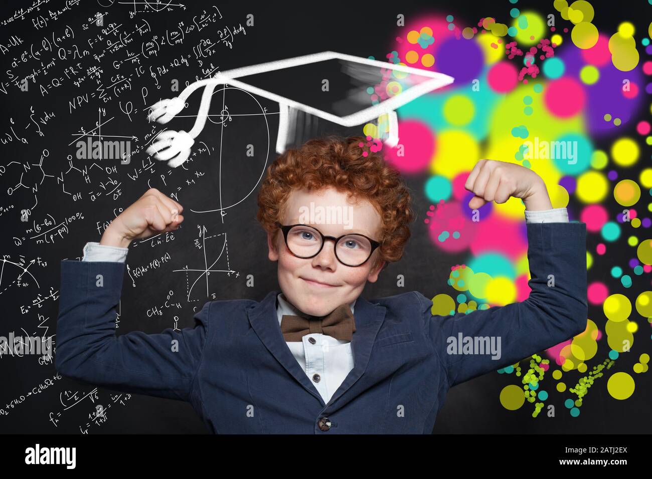 Happy kid in graduation hat portrait Stock Photo - Alamy