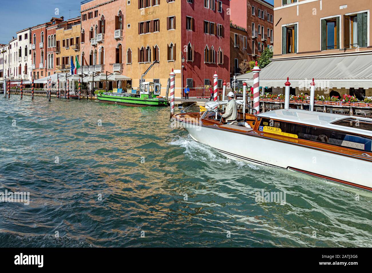 A water taxi makes it's way along the Grand Canal in Venice,Italy Stock ...