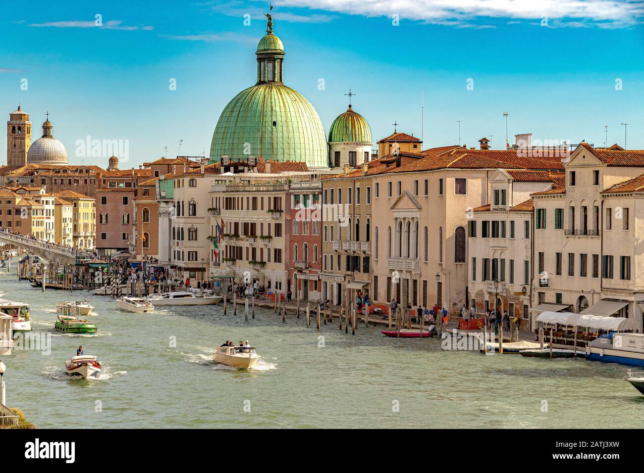 Water taxis on The Grand Canal near Santa Lucia Station with the green ...