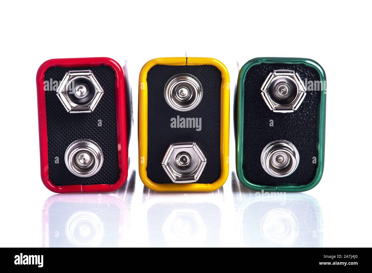 Row of Nine Volt Battery on white table close-up Stock Photo - Alamy