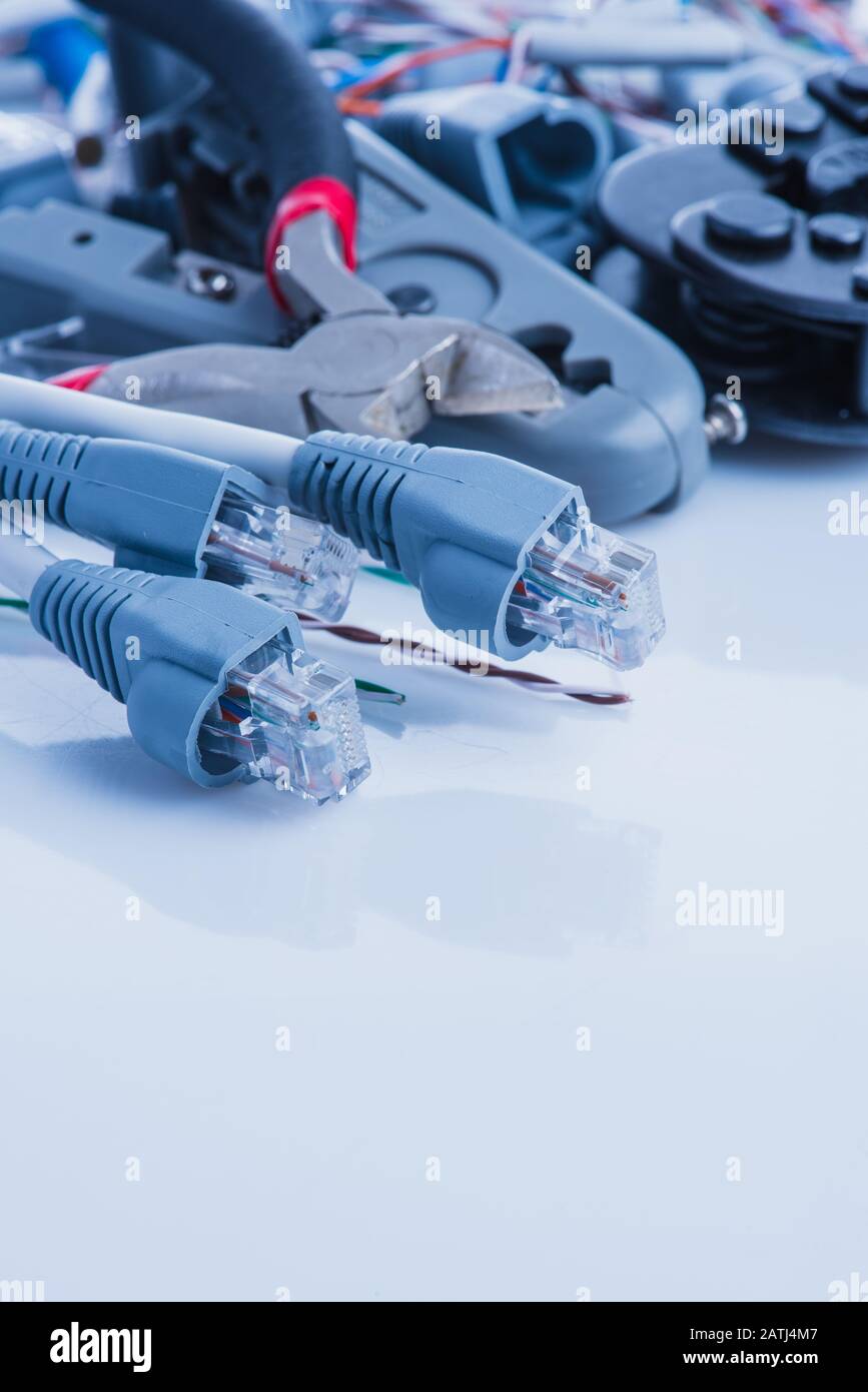 Tools and cables used in service of network ethernet patch cord Stock ...