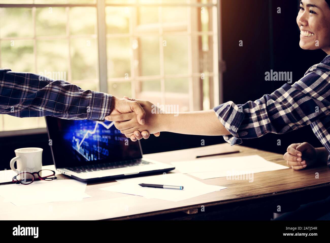Computer handshake woman hi-res stock photography and images - Alamy
