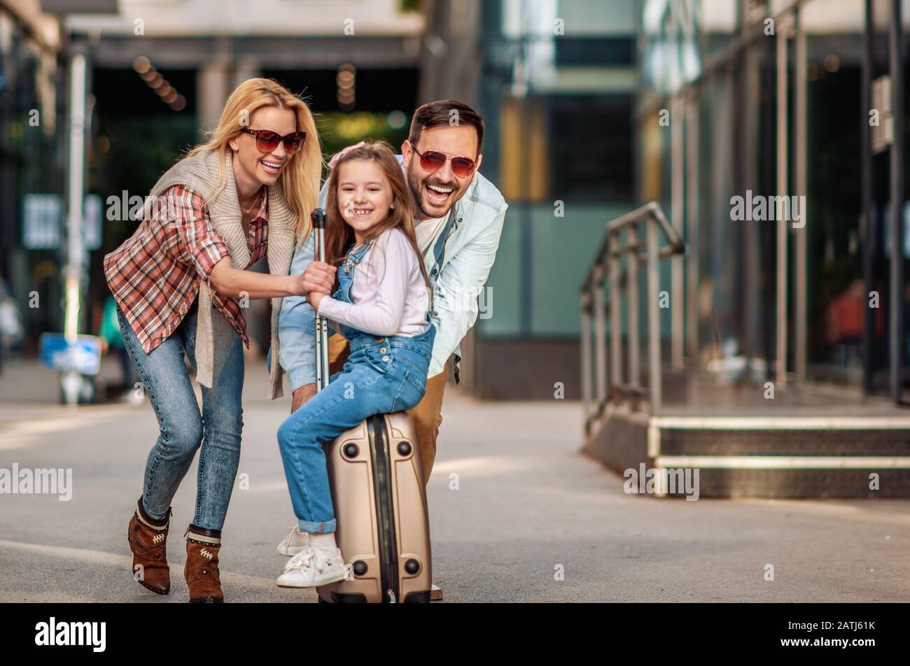 Happy family going on vacation and traveling by airplane.Family,love ...