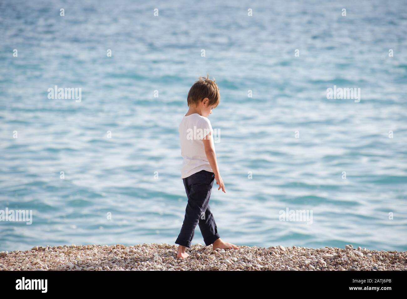 Child walking alone sad hi-res stock photography and images - Alamy
