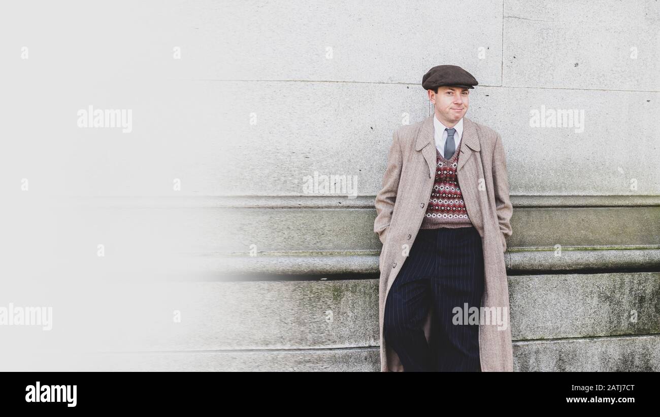 Man in 1940's dress. An extras waiting for his scene in the new film ...