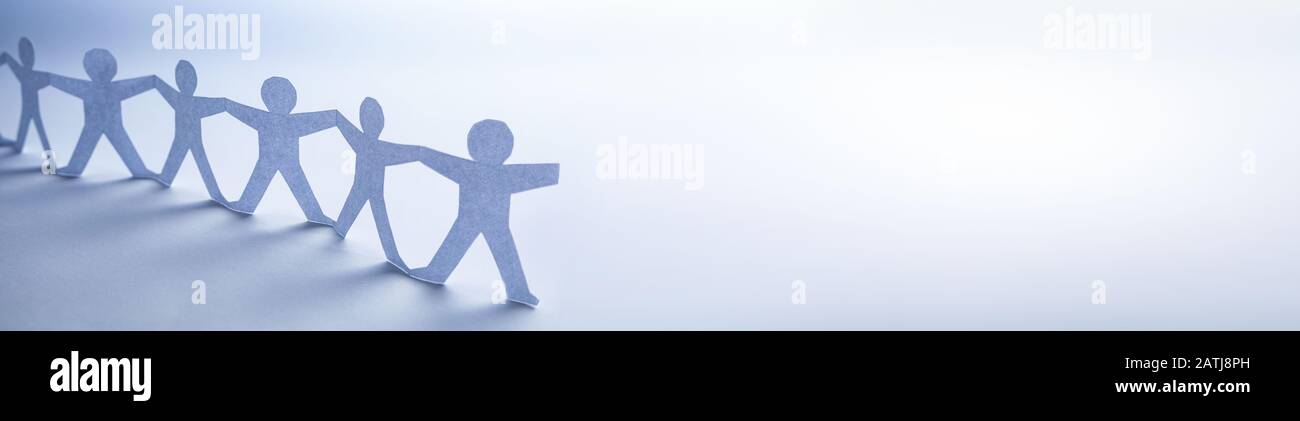 Team of paper chain people. Human chain with light and shadow. Blue ...