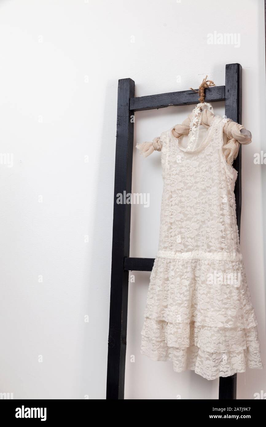 Hanging against white wall hi-res stock photography and images - Alamy