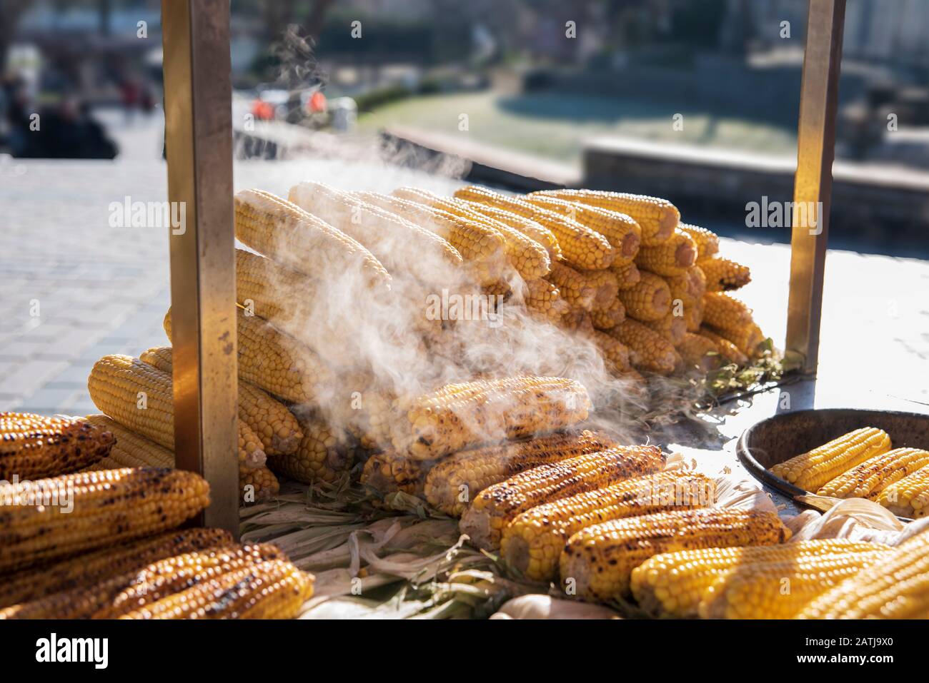Traditional street food grilled sweet corn Stock Photo - Alamy