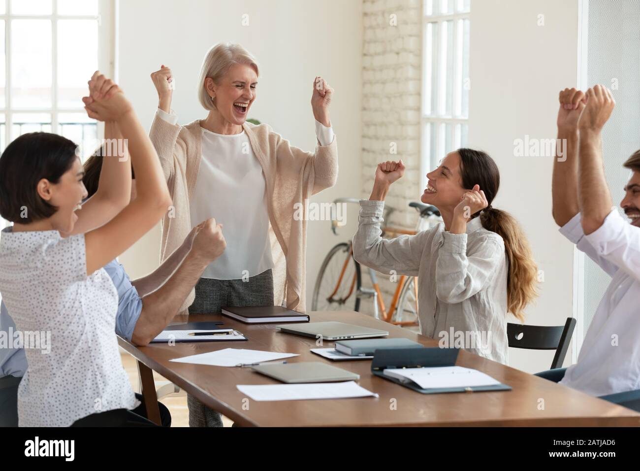 Teamwork office multicultural celebration hi-res stock photography and ...