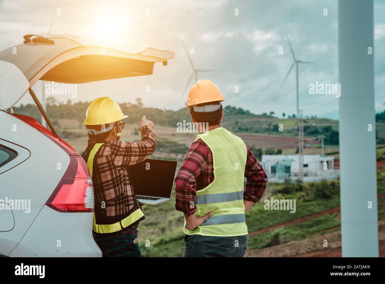 Engineering working together and planning about wind turbine electric ...