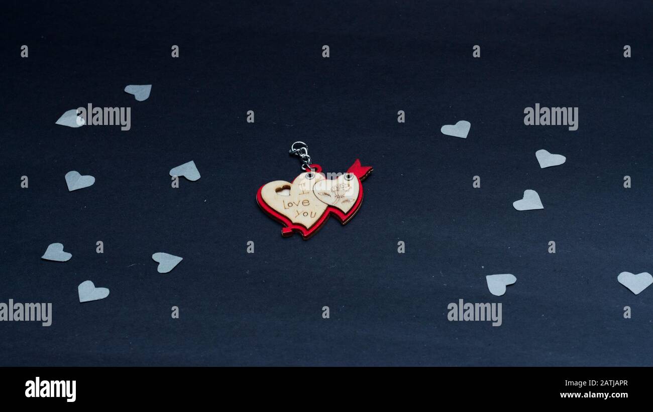 Heart shape key chain with heart shape chart on dark background Stock ...
