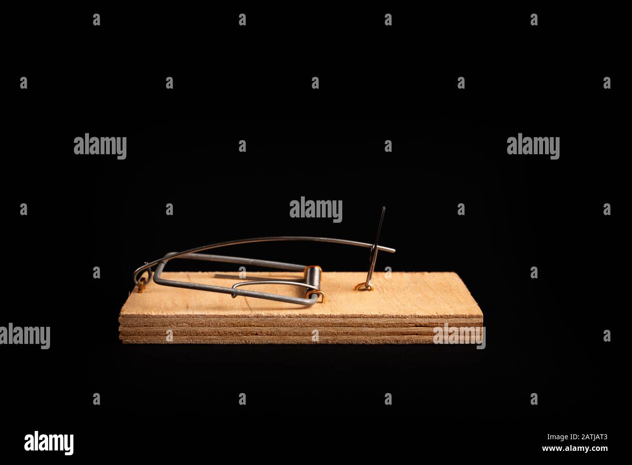 Mousetrap without bait isolate on a black background. Stock photo traps ...