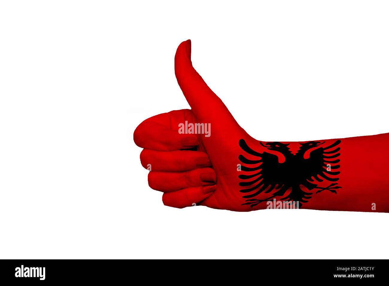 Albania flag painted on hand showing thumbs up Stock Photo - Alamy