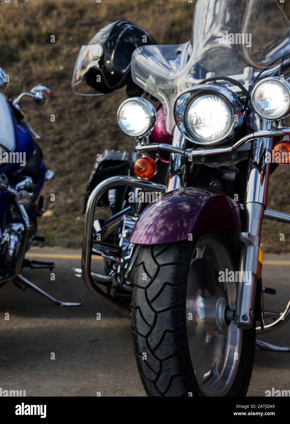 Heavy motorcycle with headlights ON. Front view Stock Photo - Alamy