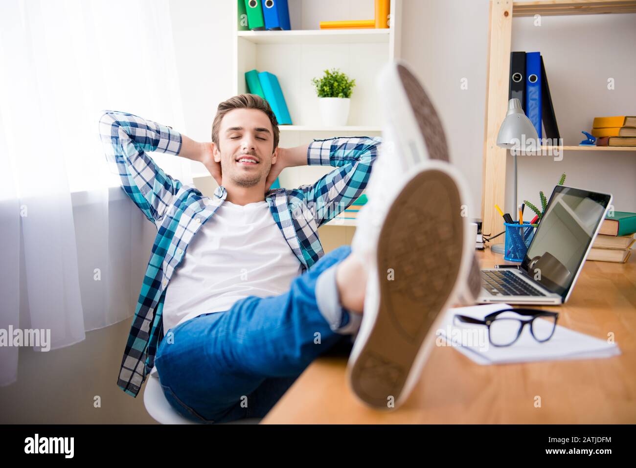 Happy man holding legs hi-res stock photography and images - Alamy