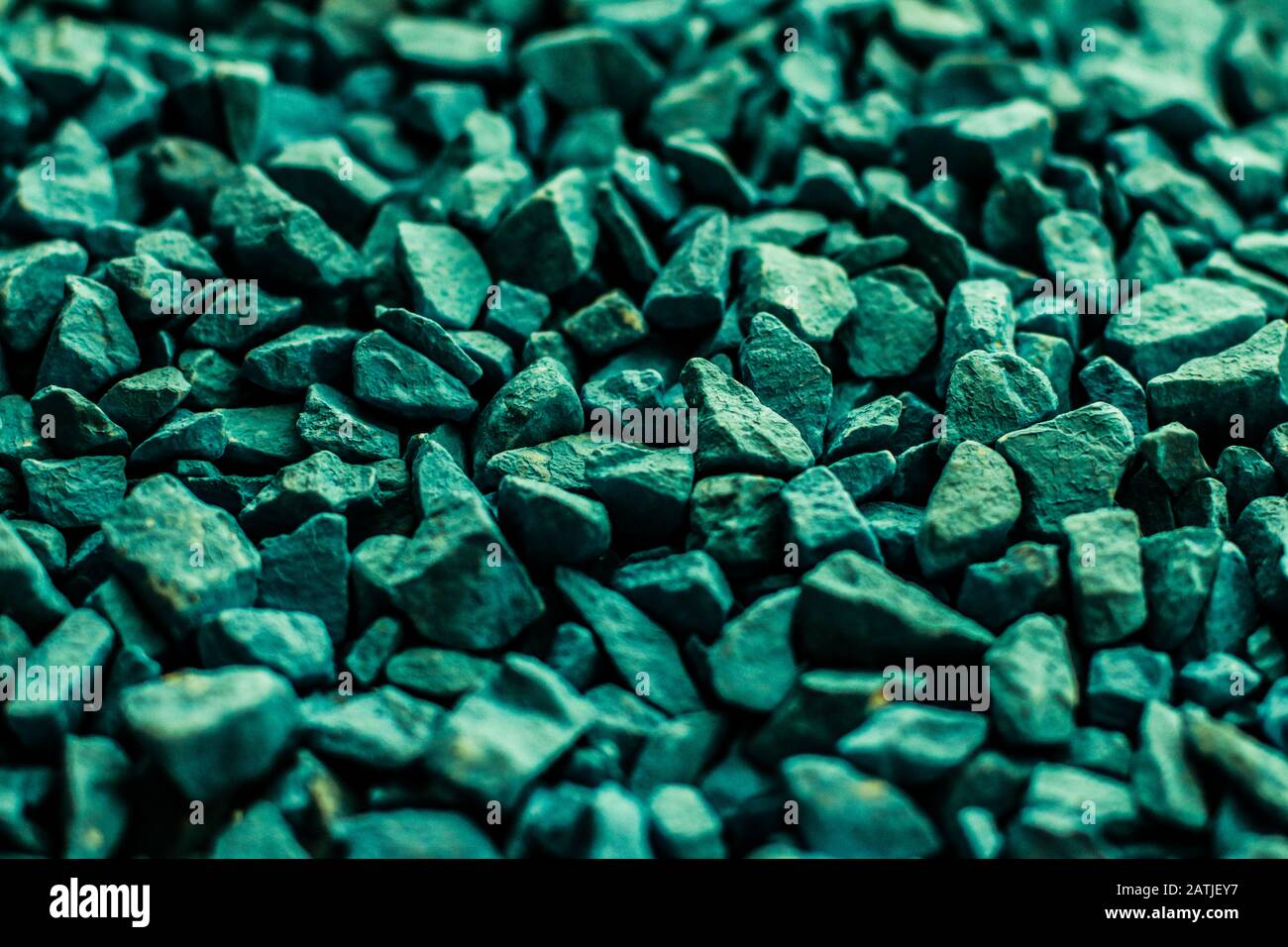 Decor, surface and nature concept - Emerald green stone pebbles as ...