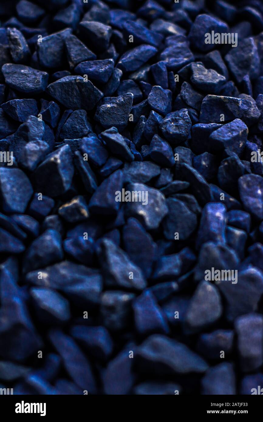 Decor, surface and nature concept - Dark blue stone pebbles as abstract ...