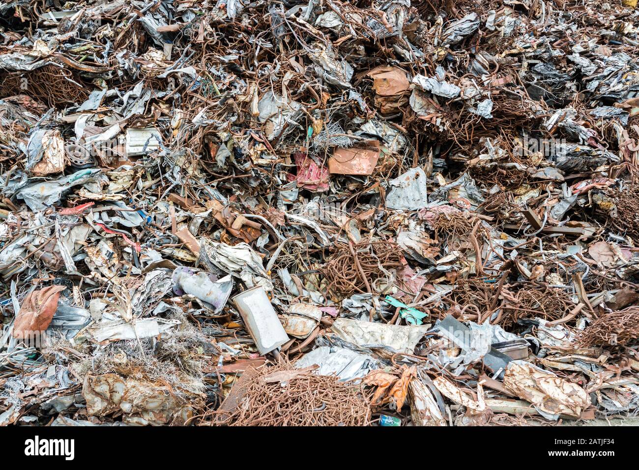 rusty old iron scrap at the recycling centre Stock Photo - Alamy