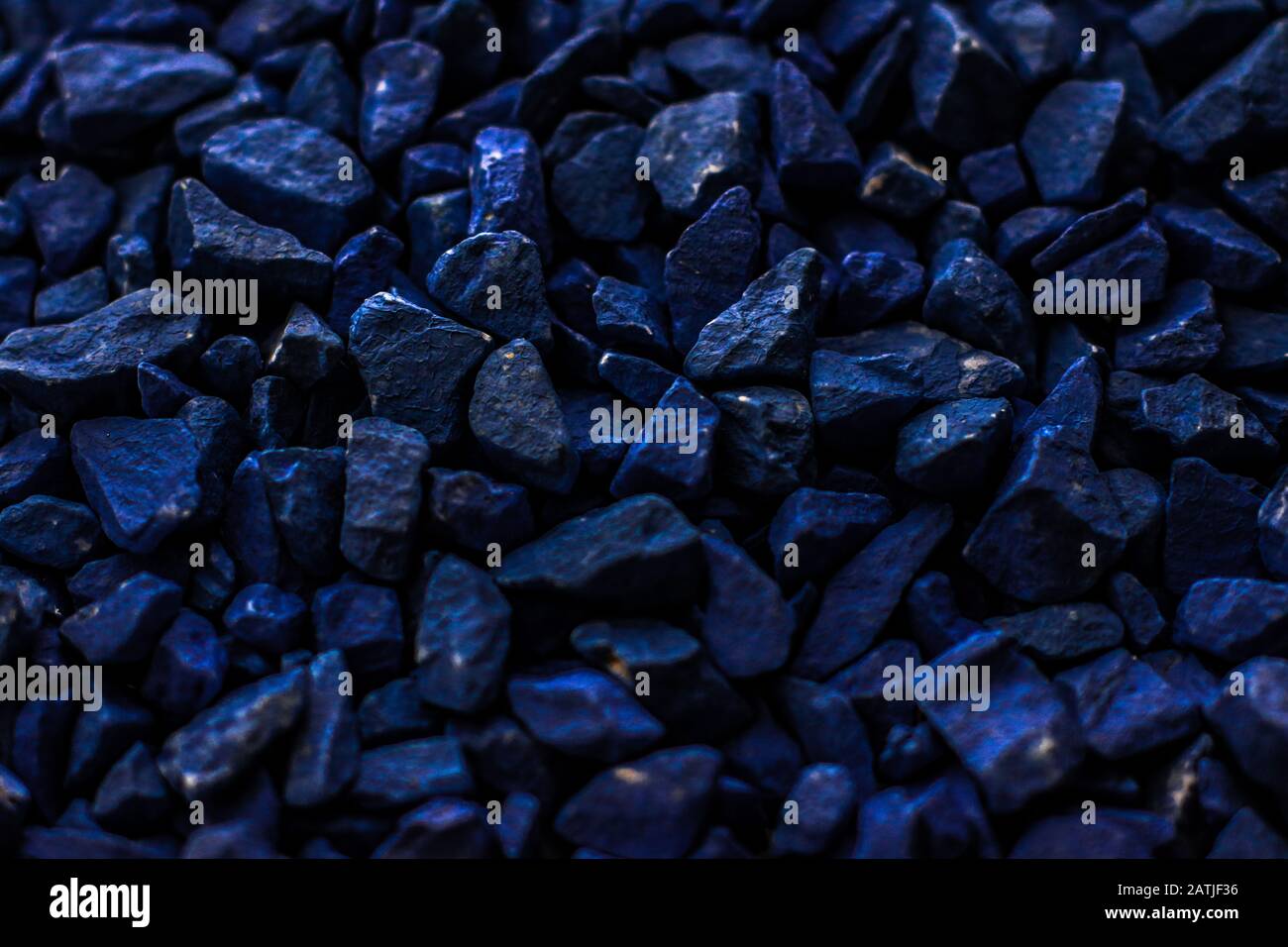 Decor, surface and nature concept - Dark blue stone pebbles as abstract ...